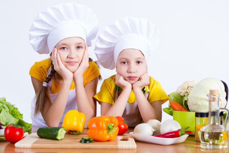 Two Cheerful Young Chef Looking Right Stock Photo - Image of learning ...