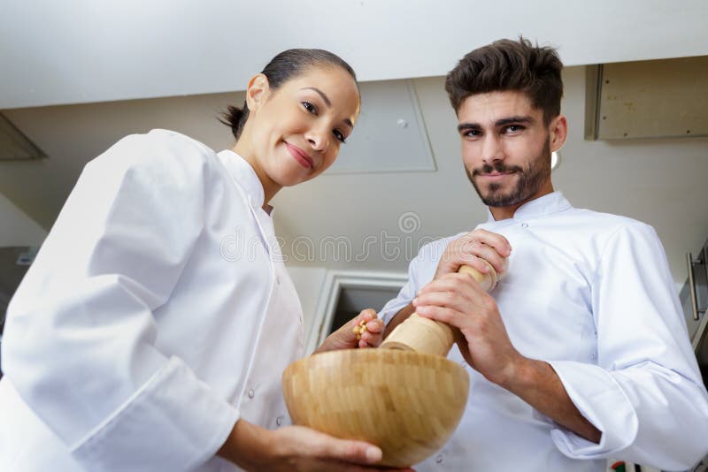 Two Chefs Smiling and Holding Ramekin Pots Stock Image - Image of ...