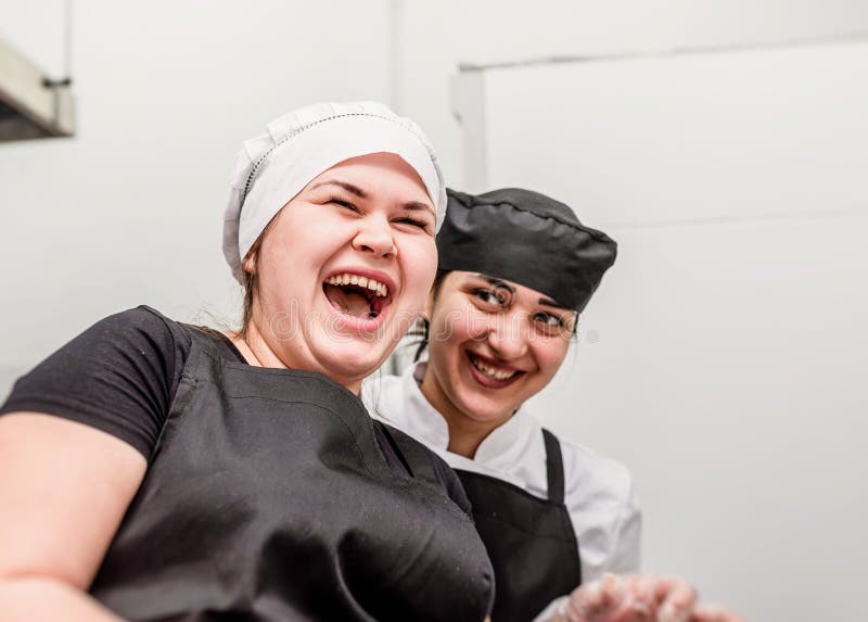 Two Chefs Laughing at the Kitchen Stock Image - Image of beautiful ...