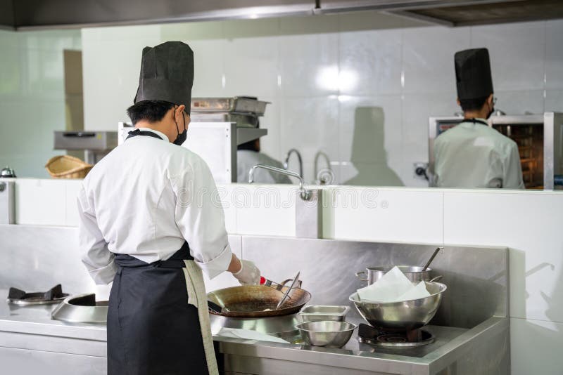 Two Chefs Prepare Meals in the Restaurant`s Kitchen. Modern Kitchen ...