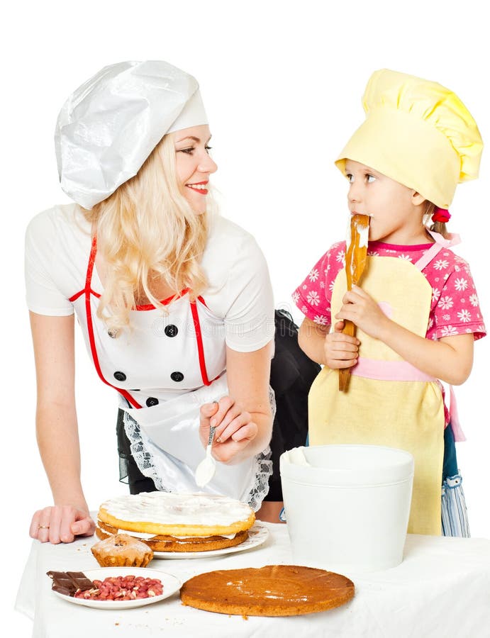 Little Chef Girls with Their Mother Making a Cake Stock Photo - Image ...