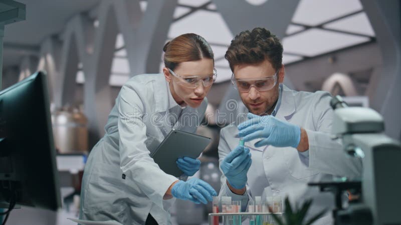 Two Chemist Looking Samples Innovation Medicines in Advanced Laboratory ...