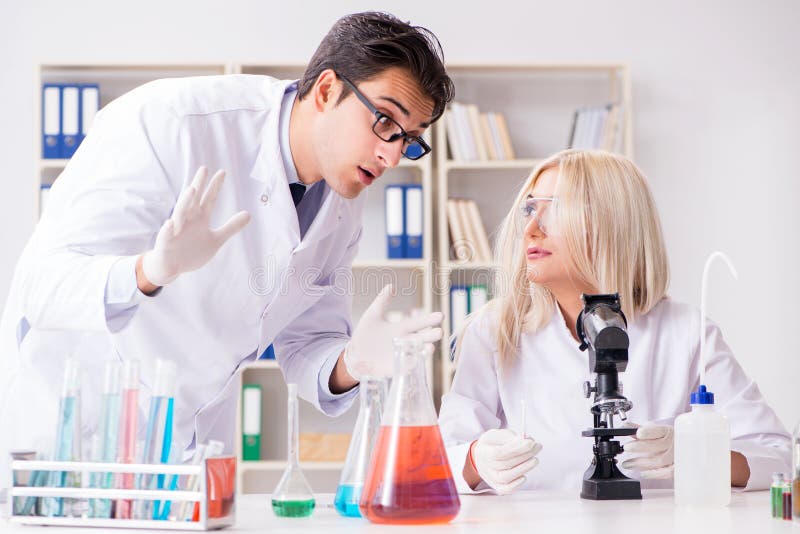 The Two Chemists Having Discussion in Lab Stock Image - Image of ...