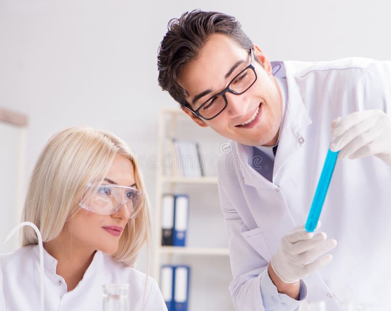 Two Chemists Having Discussion in Lab Stock Photo - Image of biohazard ...