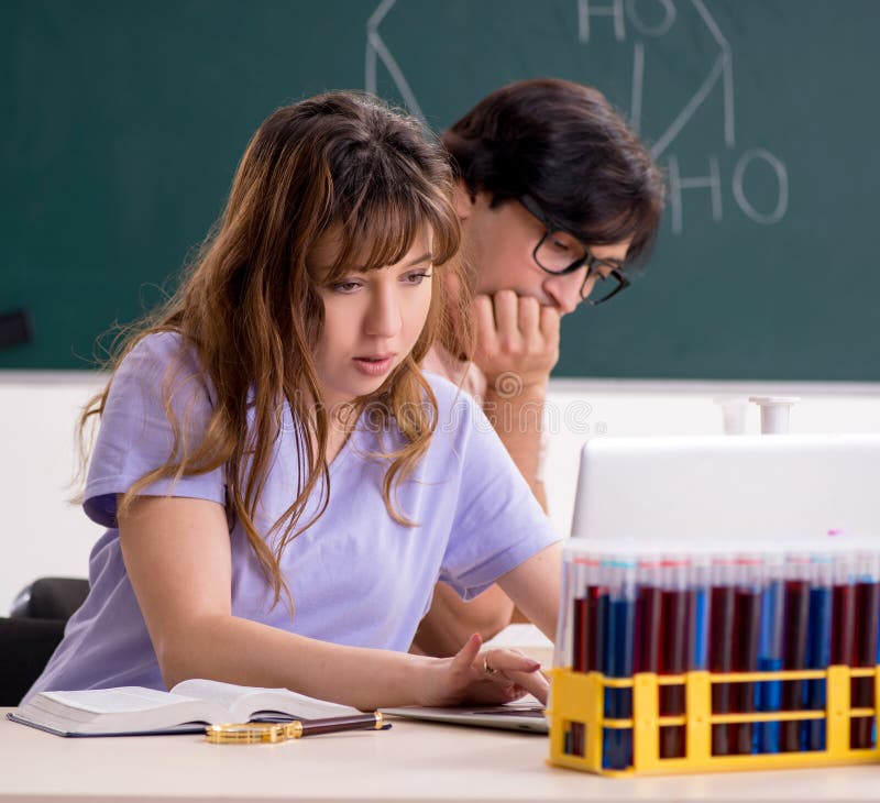Two Chemists Students in Classroom Stock Image - Image of laptop ...