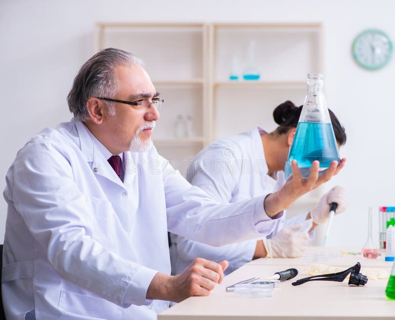Two Chemists Working in the Lab Stock Image - Image of diagnostic ...