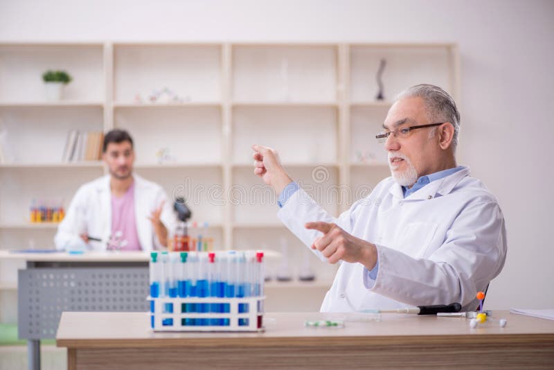 Two Male Chemists Working at the Lab Stock Image - Image of colleague ...