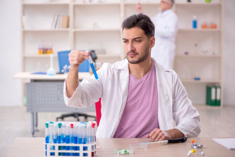 Two Male Chemists Working at the Lab Stock Photo - Image of together ...