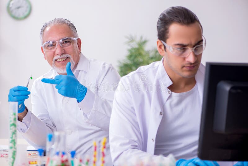 Two Chemists Working in the Lab Stock Image - Image of health ... Two Chemists Working in the Lab Stock Image - Image of health ...