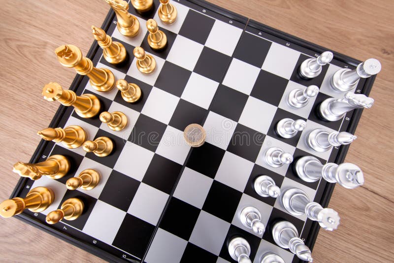 The Two Chess Pieces Placed on the Chess Board and the Euro Coin in the ...