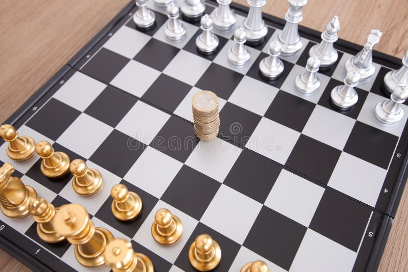 The Two Chess Pieces Placed on the Chess Board and the Euro Coin in the ...