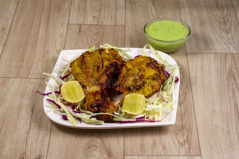 Two Chicken Leg Piece in Plate on Wooden Background Stock Image - Image ...