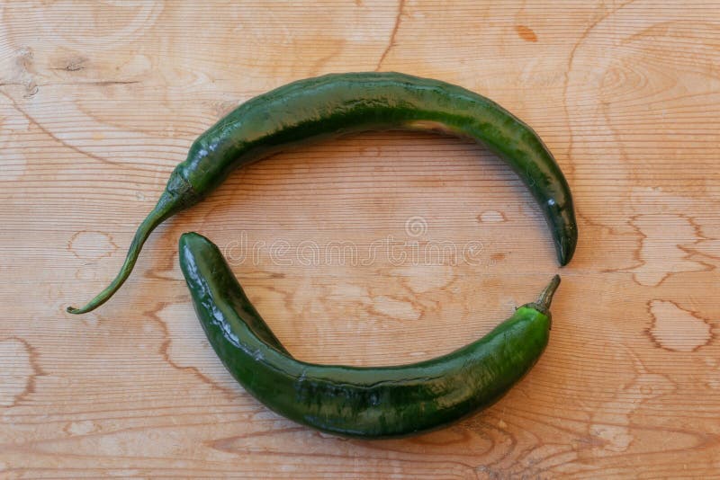 Two Chilaca Peppers Forming a Circle, Green Vegetable, Centered, Copy ...