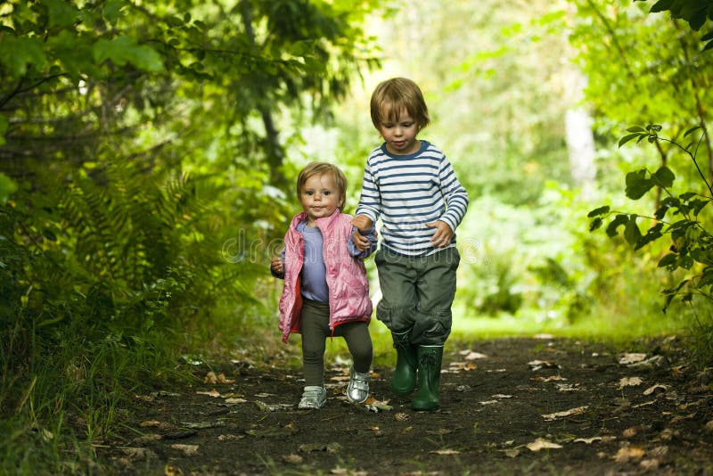 Two children stock image. Image of sibling, forest, sister - 27267143
