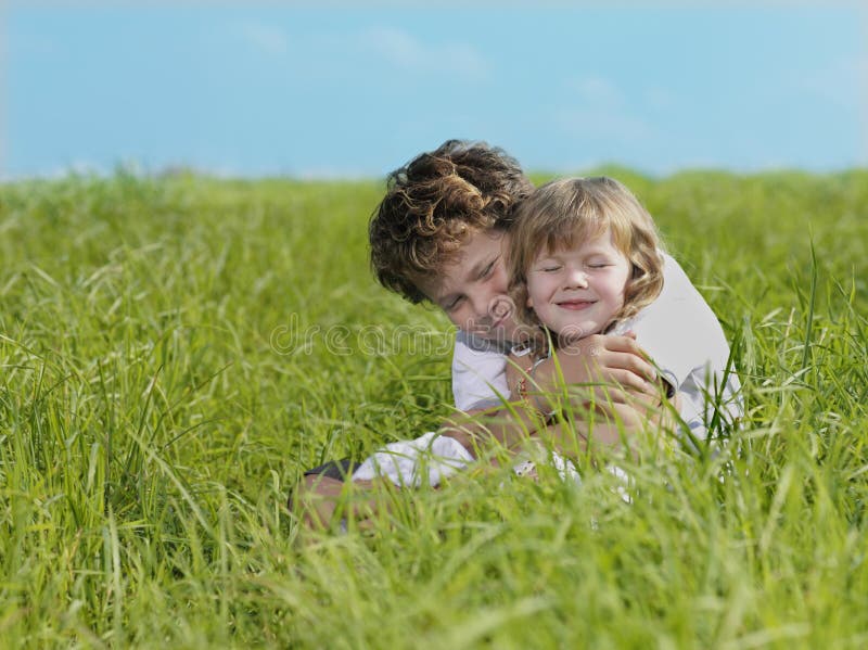 Two children stock image. Image of cheerful, grass, beauty - 7108781