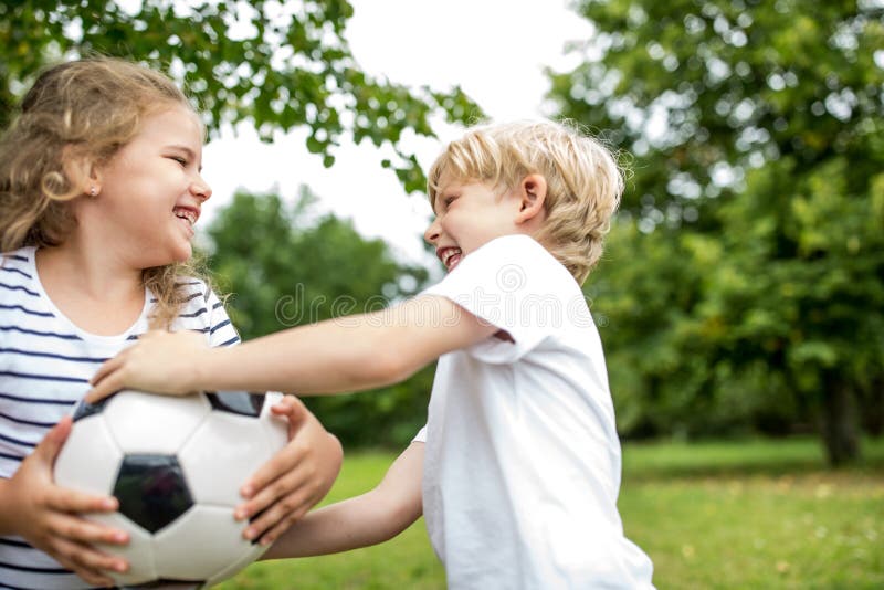 Family Children Argue Football Garden Stock Photos - Free & Royalty ...