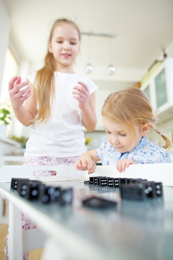 Two Children Build Sandcastle on Beach. Boy and Girl Play with Sand on ...