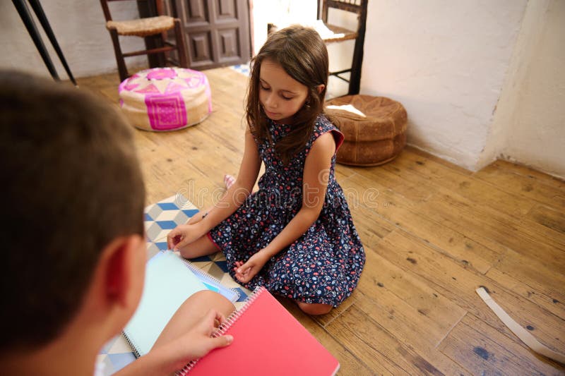 Children Engaged in Homework Activity Stock Image - Image of activity ...