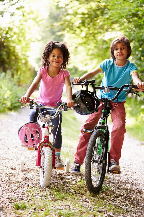 Two Children on Cycle Ride in Countryside Stock Photo - Image of ...