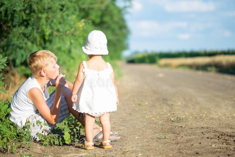 Two children stock photo. Image of yellow, girl, child - 56322808