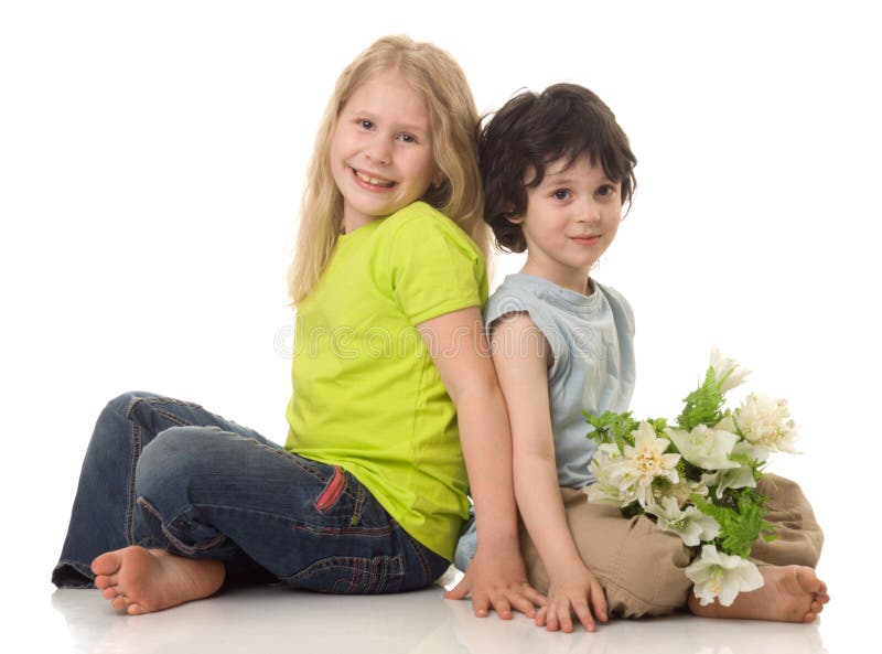 Two children with flowers stock photo. Image of giving - 9747116