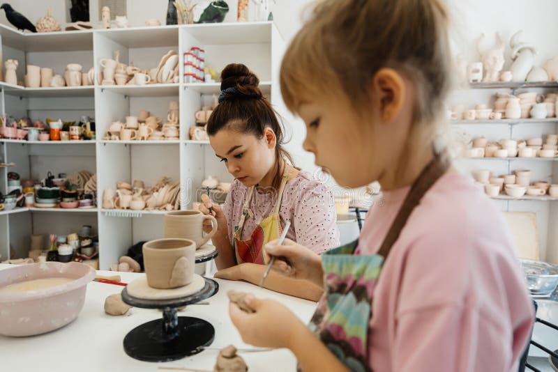 Young Artists Engaged in Pottery Making at a Creative Studio Stock ...