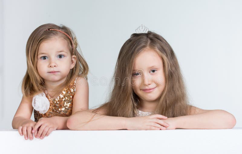 Two Children Girls stock image. Image of caucasian, sitting - 81765783