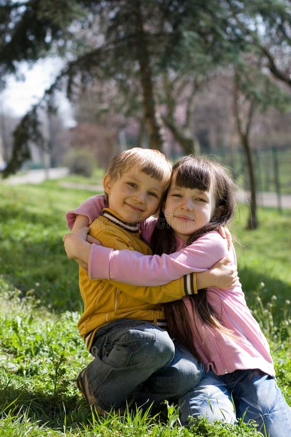 Two Children hugging stock photo. Image of female, male - 2191252