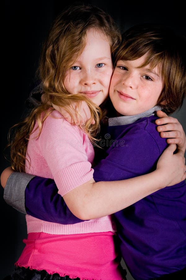 Two children hugging stock image. Image of eight, female - 7438421