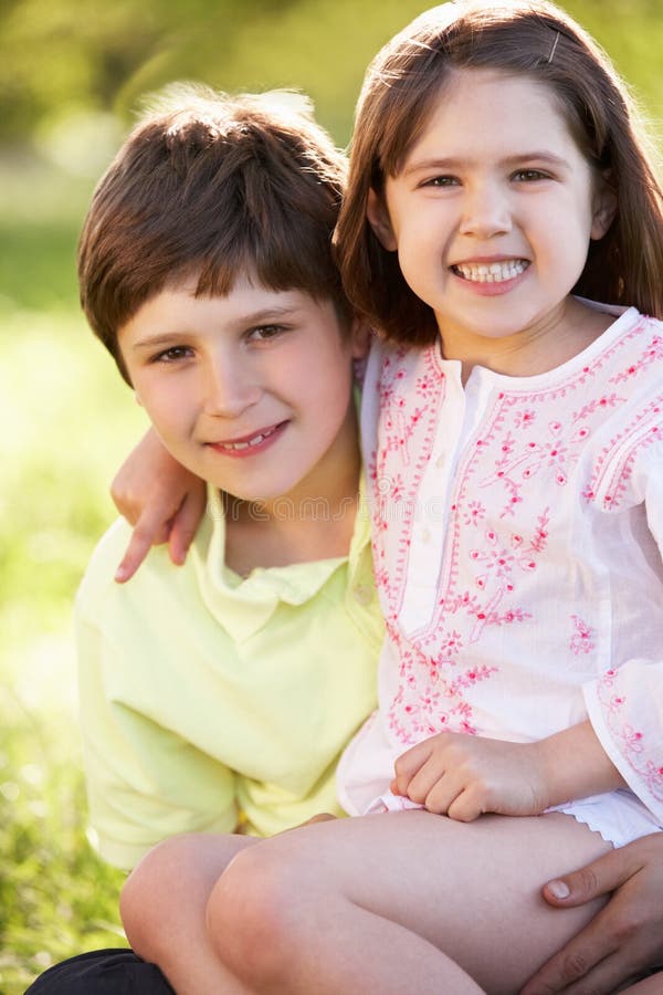 Two Children Hugging in Summer Field Stock Photo - Image of person ...