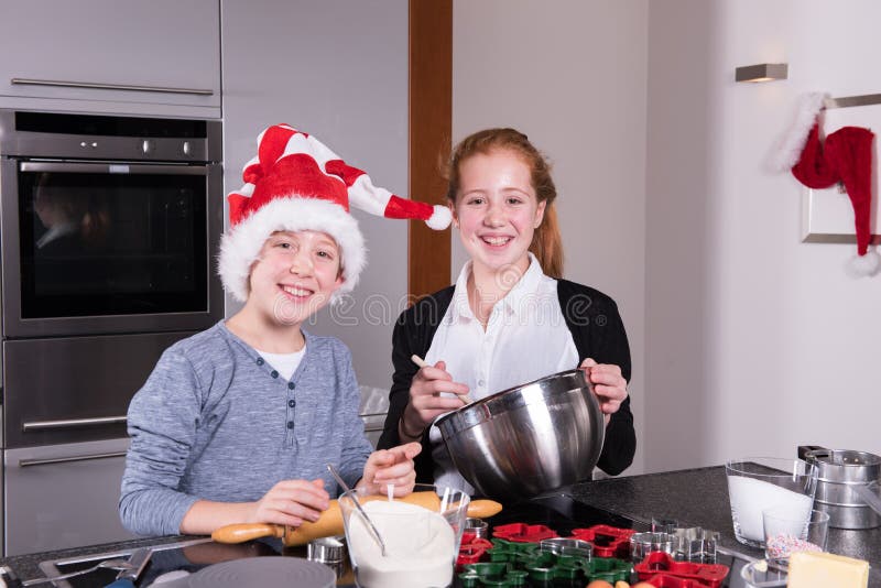 Two Children in the Kitchen Preparing Christmas Bakery Stock Photo ...