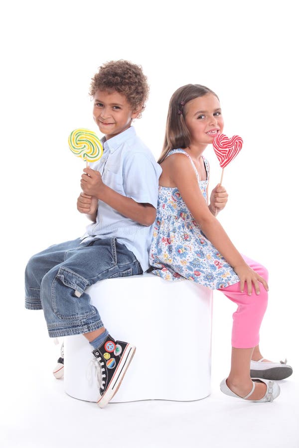 Two Children with Lollipops Stock Photo - Image of good, fair: 31383156