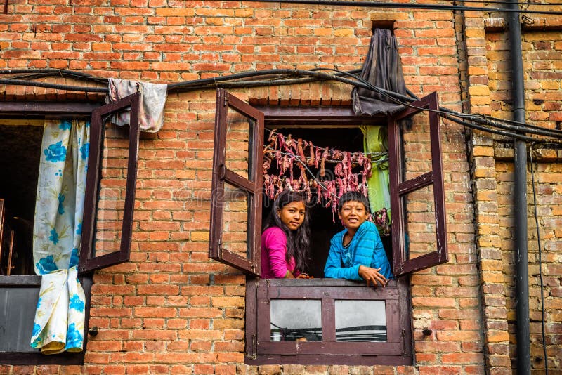 Two Children Looking Out of a Window in Nepal Editorial Photography ...