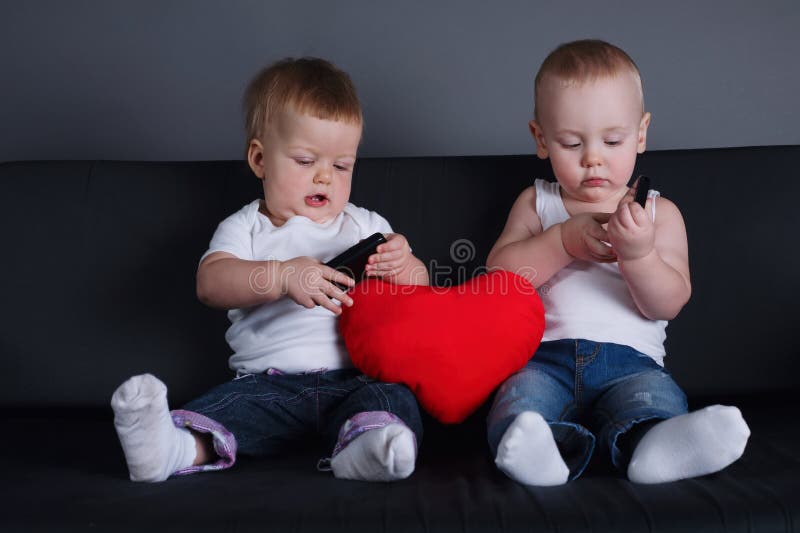 Two Children with Mobile Phones on Date Stock Image - Image of girl ...