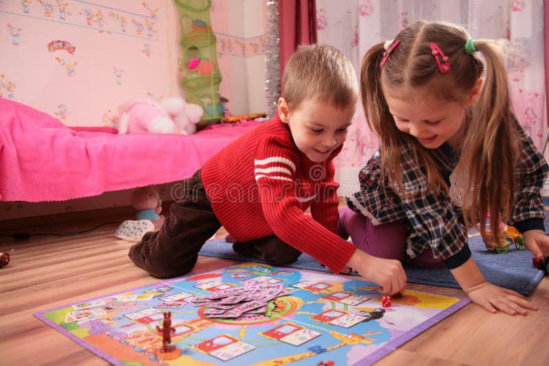 Two Children Play in Playroom Stock Photo - Image of hand, happy: 4485124
