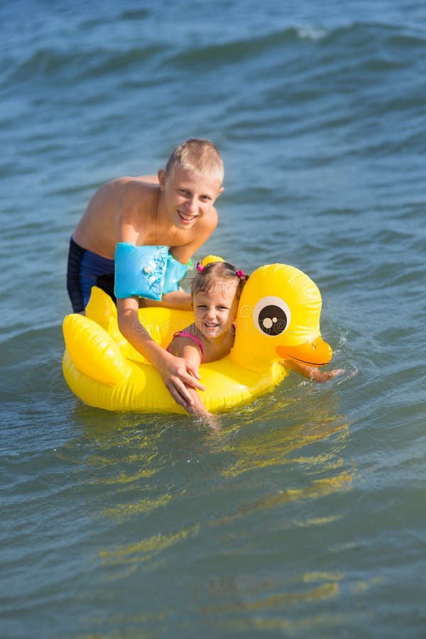 Two Children Play of the Sea Stock Image - Image of caucasian, ocean ...