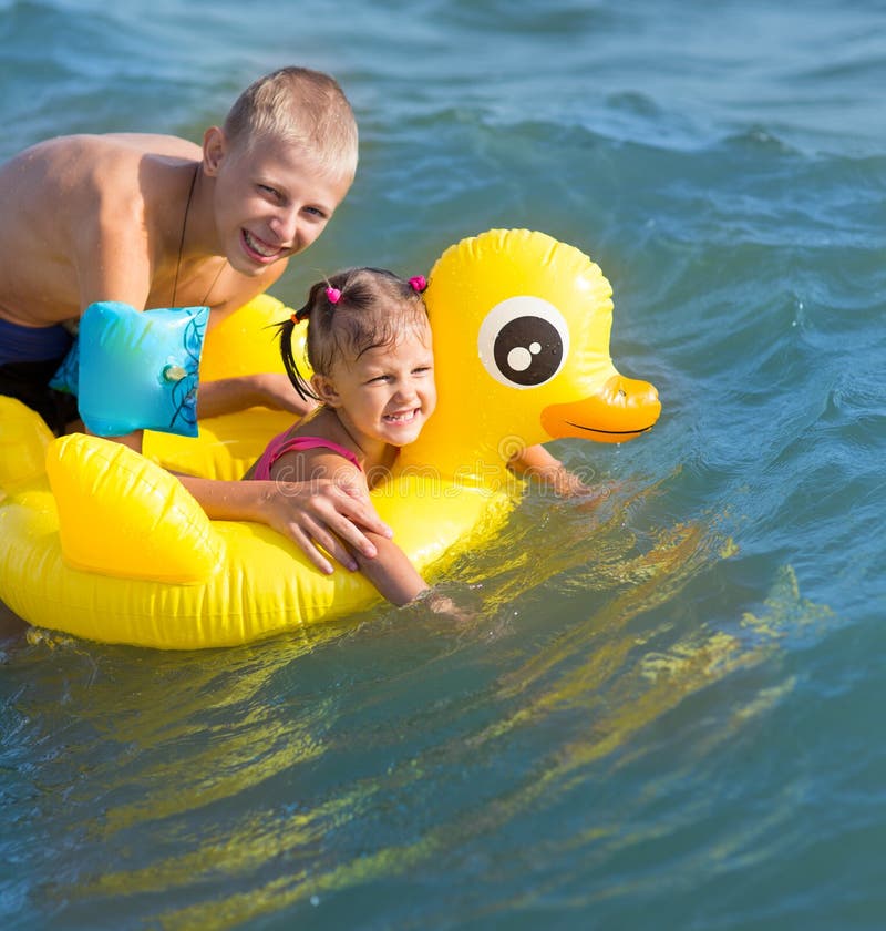 Two Children Play Of The Sea Stock Image - Image of active, healthy ...