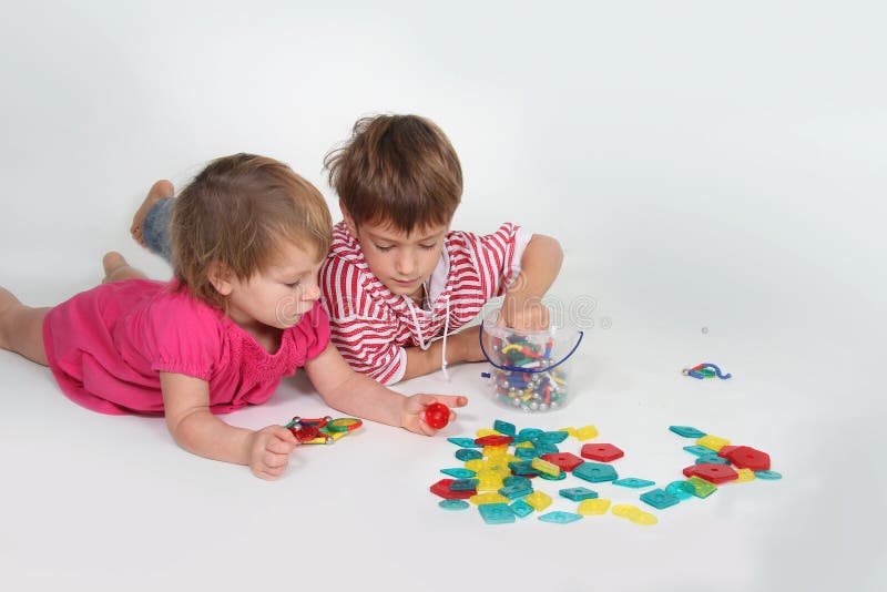 Two children playing stock photo. Image of friendship - 22262684