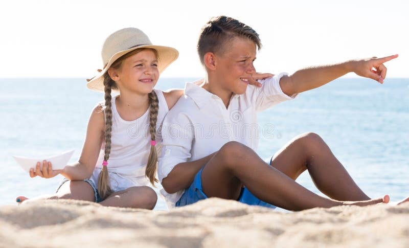 Two Children Pointing Beach Stock Photo - Image of enjoying, leisure ...