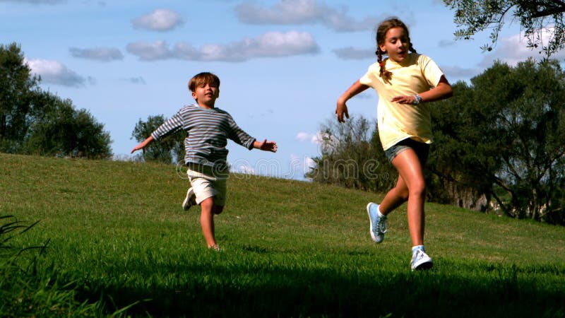 Children Running in Park during Race Stock Video - Video of finishing ...