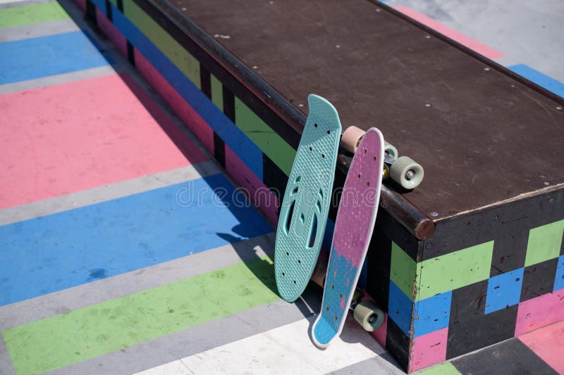 Two Children S Skateboards in Close-up at Grind Boxes of the Skatepark ...