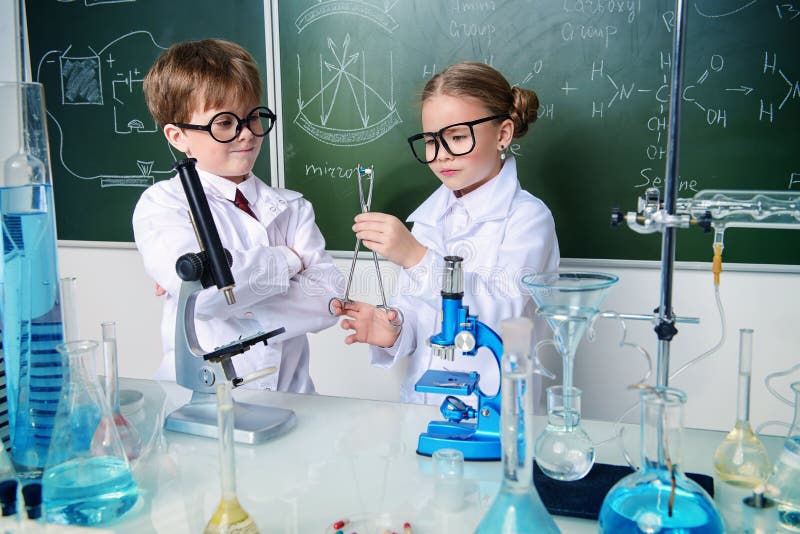 Two children scientists stock image. Image of childhood - 131032119