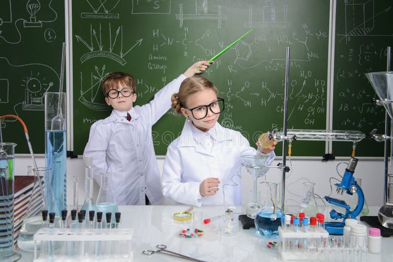 Two children scientists stock image. Image of childhood - 131032119