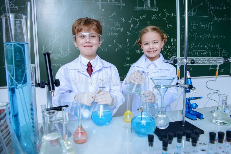 School children scientists stock image. Image of equipment - 119464713