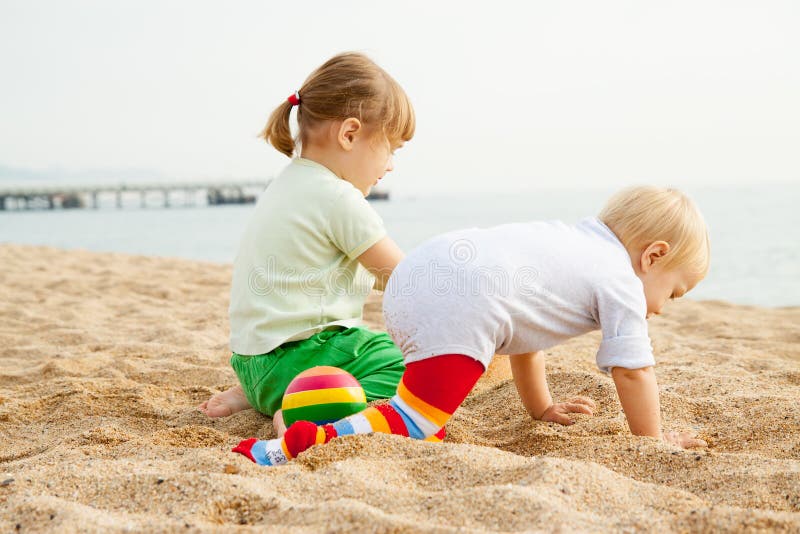 Children at the Seaside Playing Stock Photo - Image of play, leisure ...
