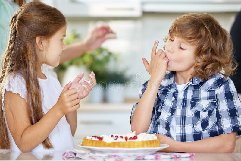 Two Children Tasting from Red Currant Fruitcake Stock Image - Image of ...