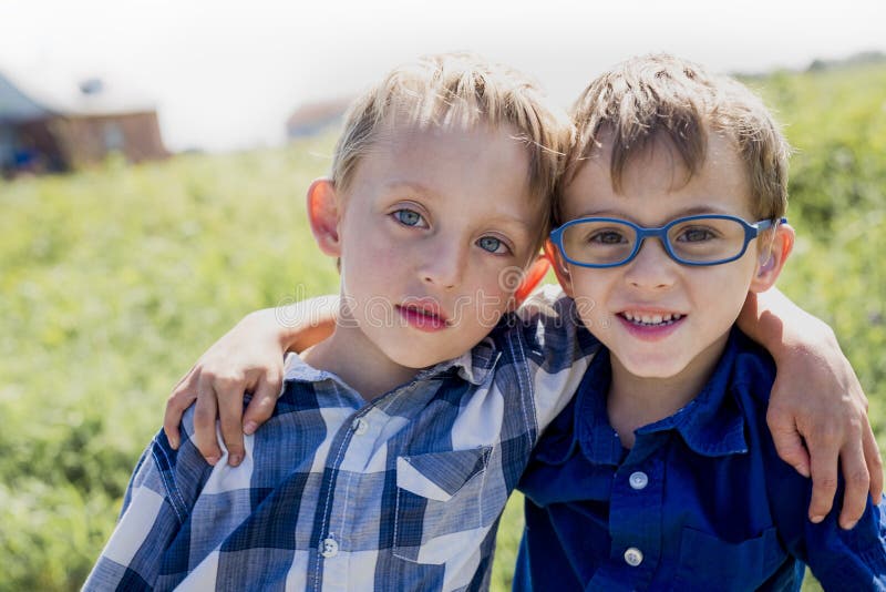 Two Children Together in Field Stock Image - Image of friends, child ...