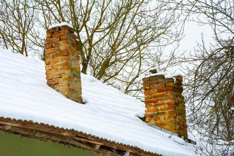 Two chimneys on the roof stock image. Image of autumn - 355842805