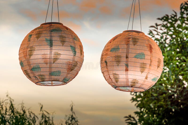 Two Chinese Happiness Balloons during Sunset in Rural Backyard Stock ...