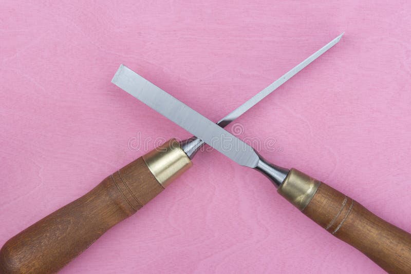 Two Chisels on a Pink Background Stock Photo - Image of brown ...